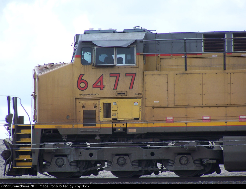 Trailing Helper Locomotive UP 6477, apparently still under warranty.